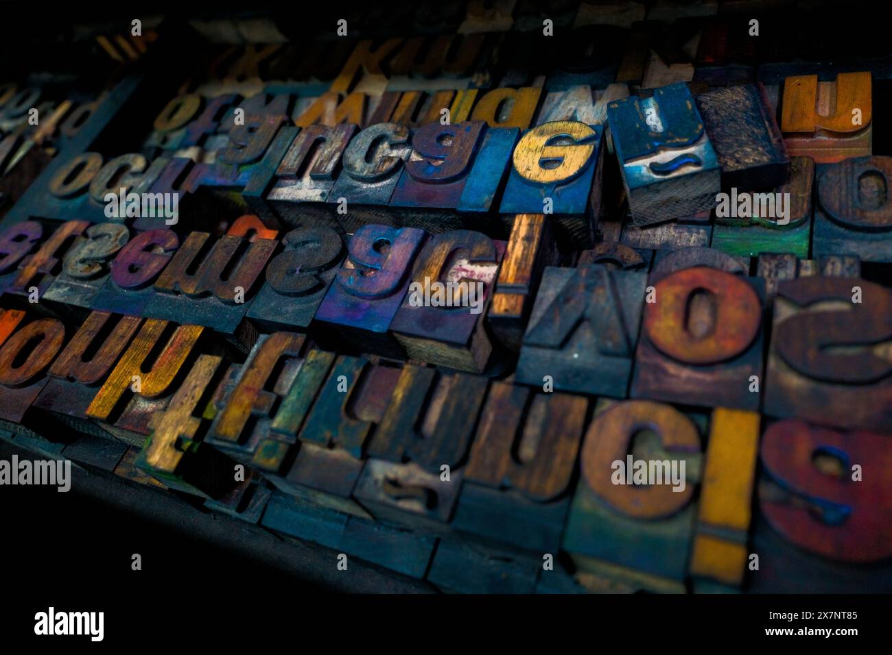 The movable wooden letterpress types are seen stored in a tray at an ...