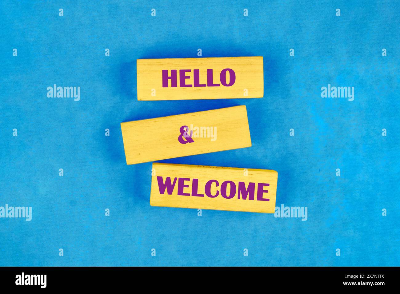 Communication concept, introduction. Words HELLO and WELCOME on blocks ...