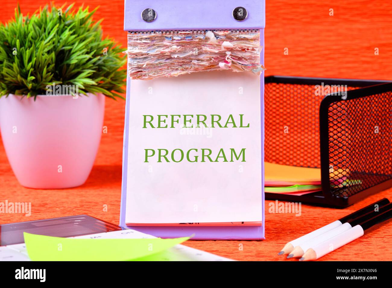 Business concept Words 'REFERRAL PROGRAM' on a desktop calendar with ...
