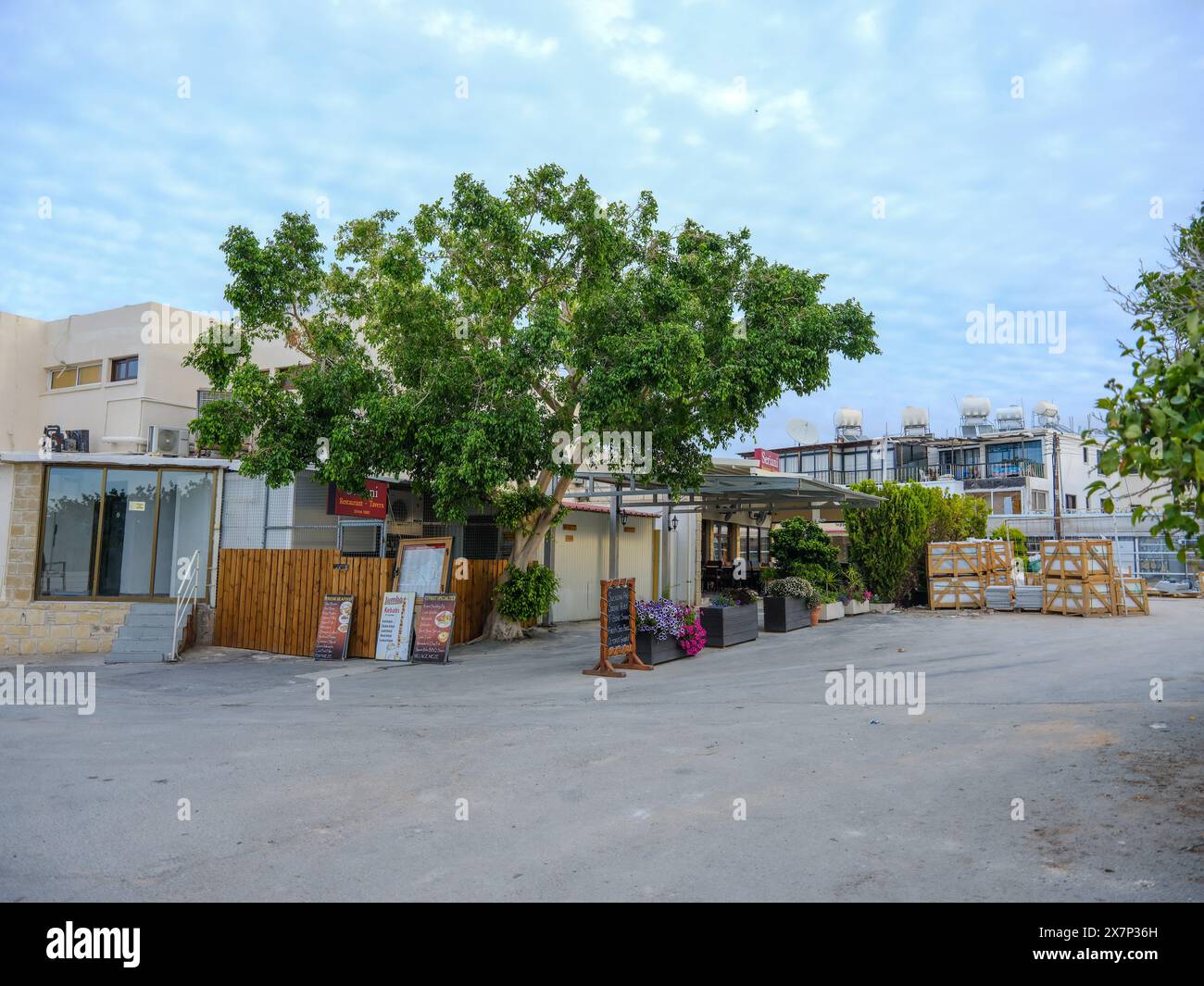 May 2024, Shop and restaurant signs outside the rear of shops and ...