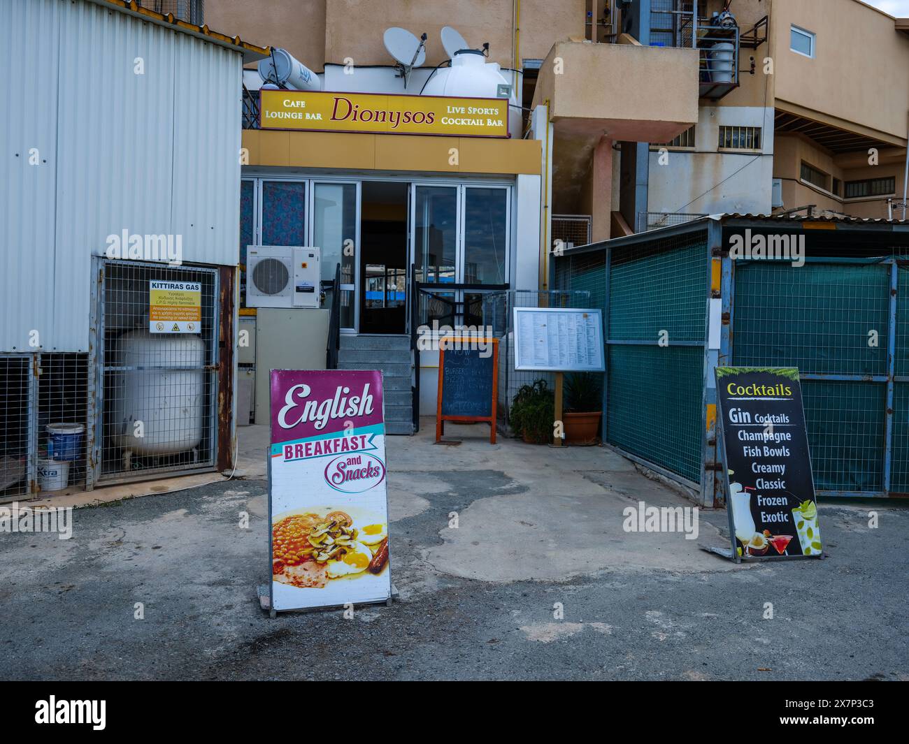 May 2024, Shop and restaurant signs outside the rear of shops and ...