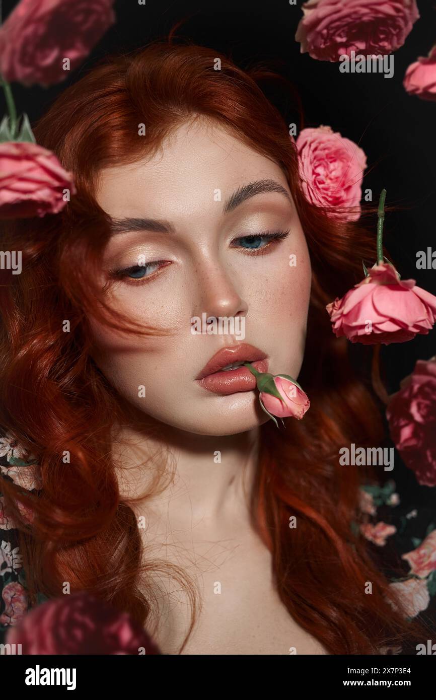 Elegant woman striking blue hi-res stock photography and images - Alamy