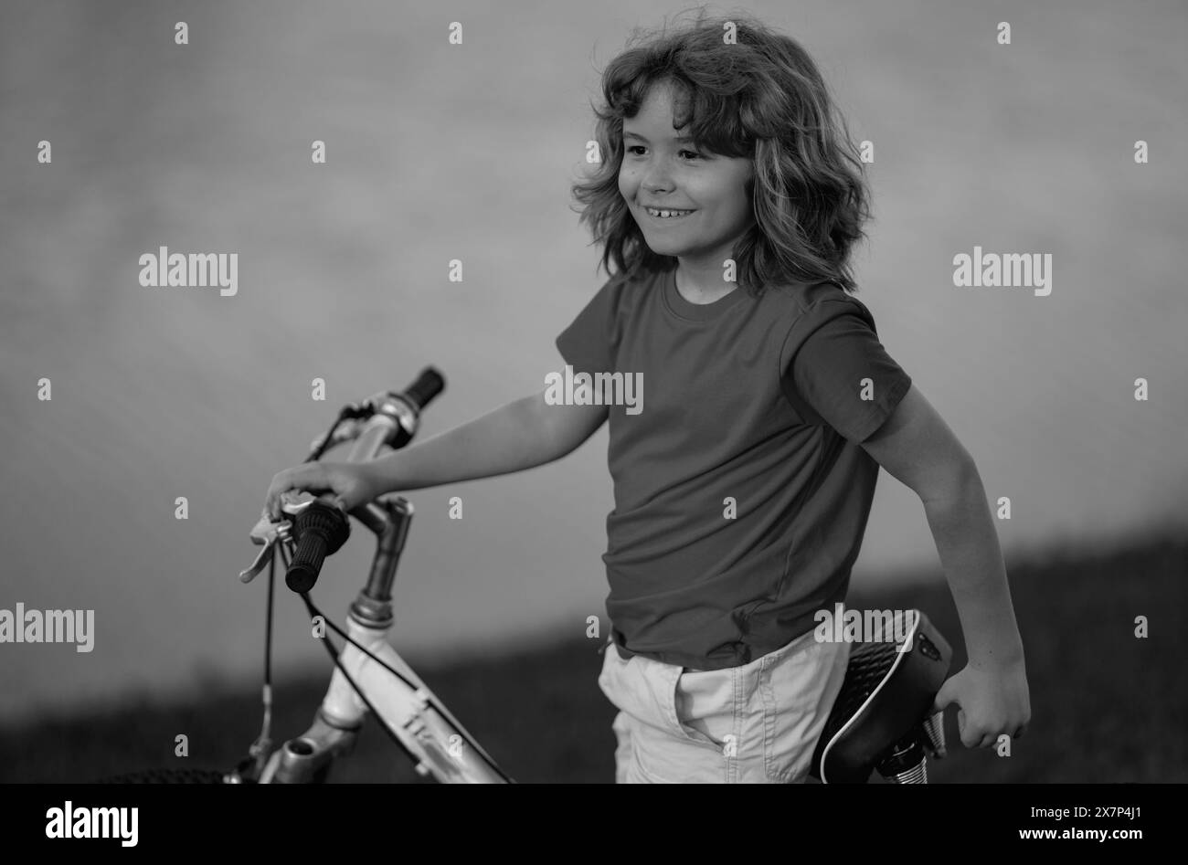 Kid riding cycle Black and White Stock Photos & Images - Alamy