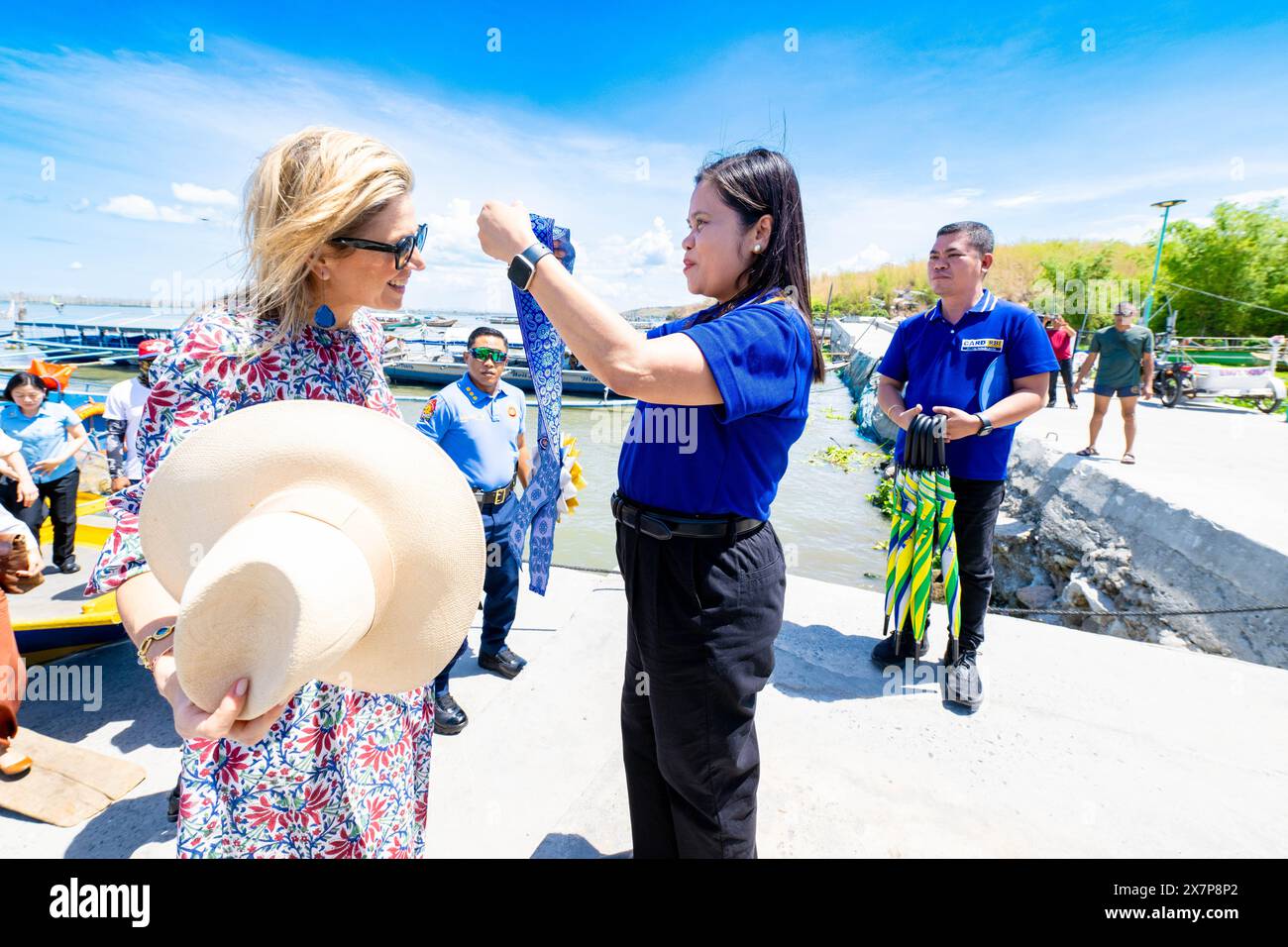 TALIM ISLAND - Queen Maxima visits CARD-MRI and Pioneer Insurance on ...