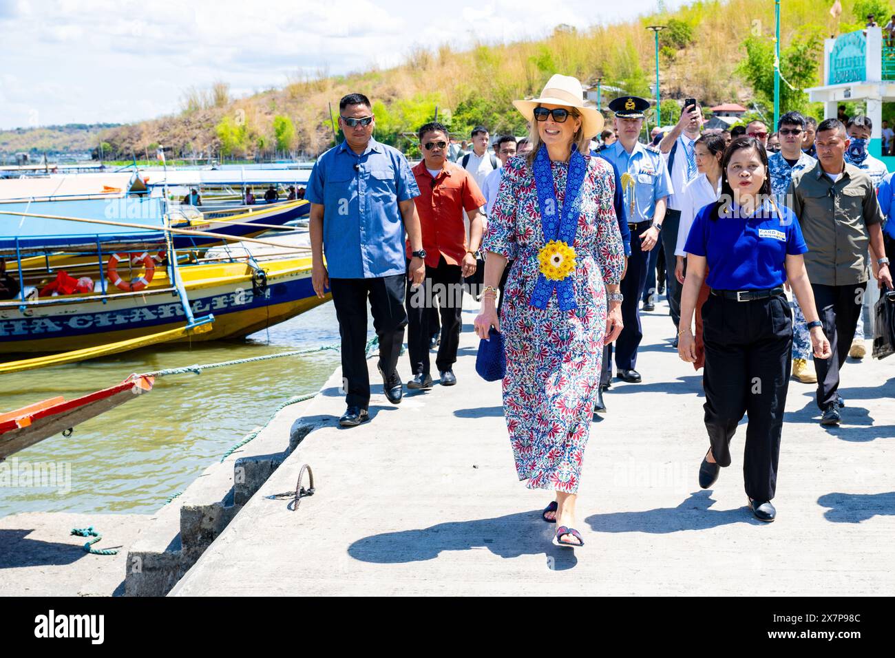 TALIM ISLAND - Queen Maxima visits CARD-MRI and Pioneer Insurance on ...