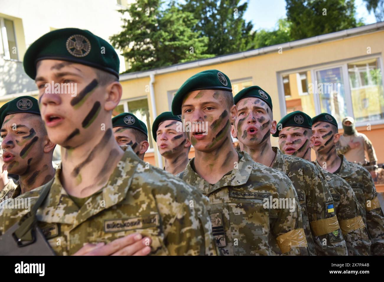 Cadets sing the national anthem of Ukraine during the opening of the ...