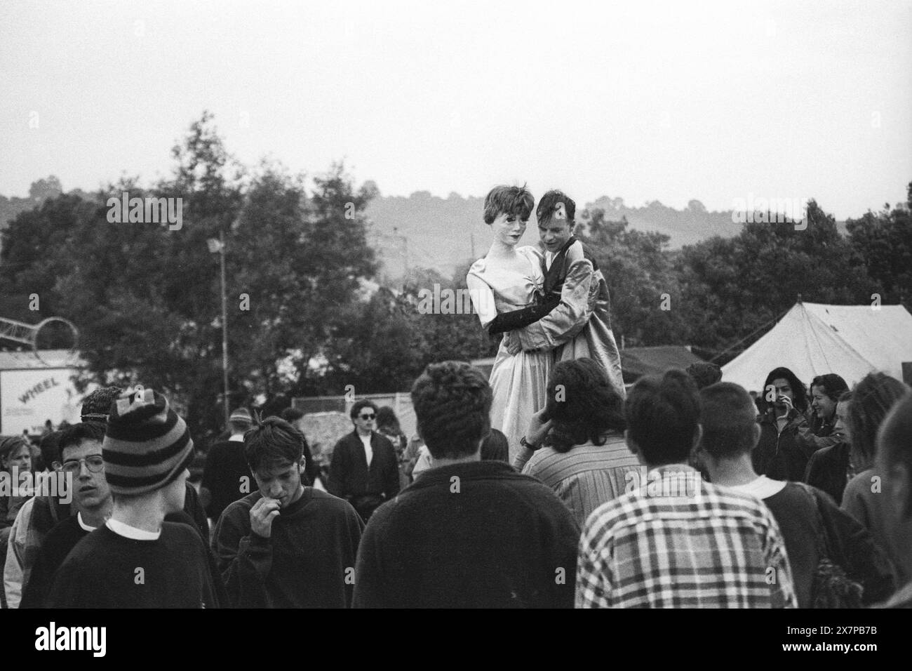 CIRCUS FIELD, GLASTONBURY 95: Performers perform on stilts in the ...