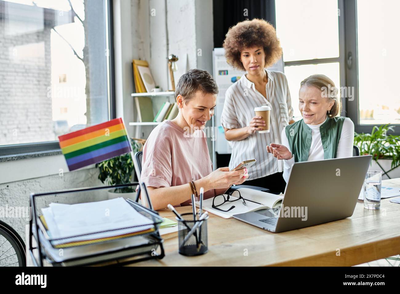 Joyous diverse businesswomen, including members of the LGBT community ...