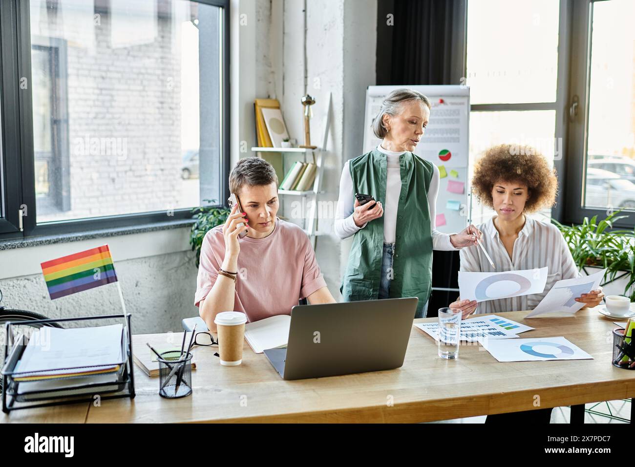 Enthusiastic diverse businesswomen, including members of the LGBT ...