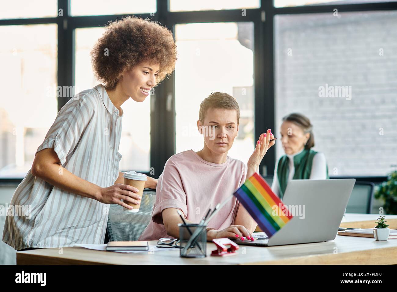 Dedicated diverse businesswomen working together on project in office ...