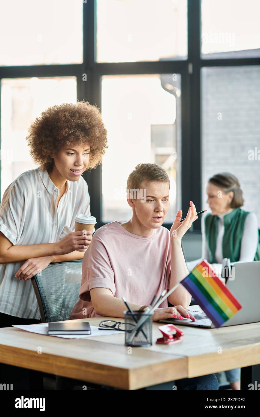 Devoted diverse businesswomen working together on project in office ...