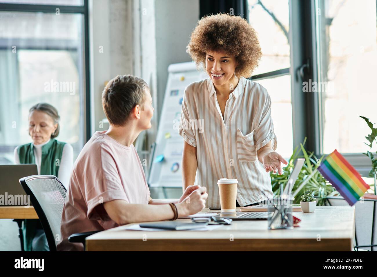 Beautiful diverse businesswomen working together on project in office ...
