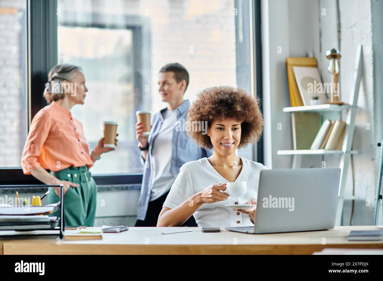 Hard working african american businesswoman using laptop, with her ...