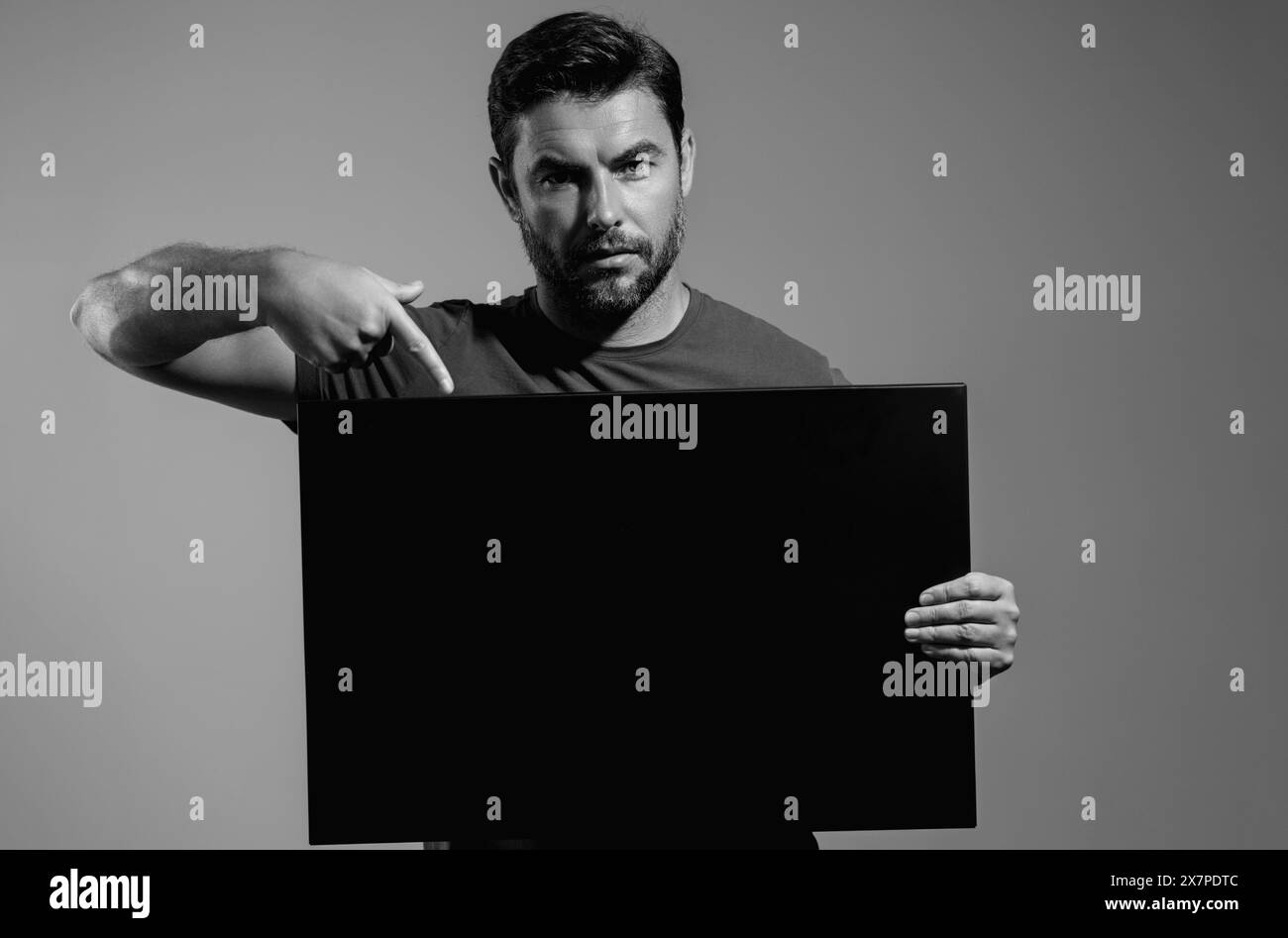 Man Holds Sign With Copy Space Placard Ready For Copy Space Product