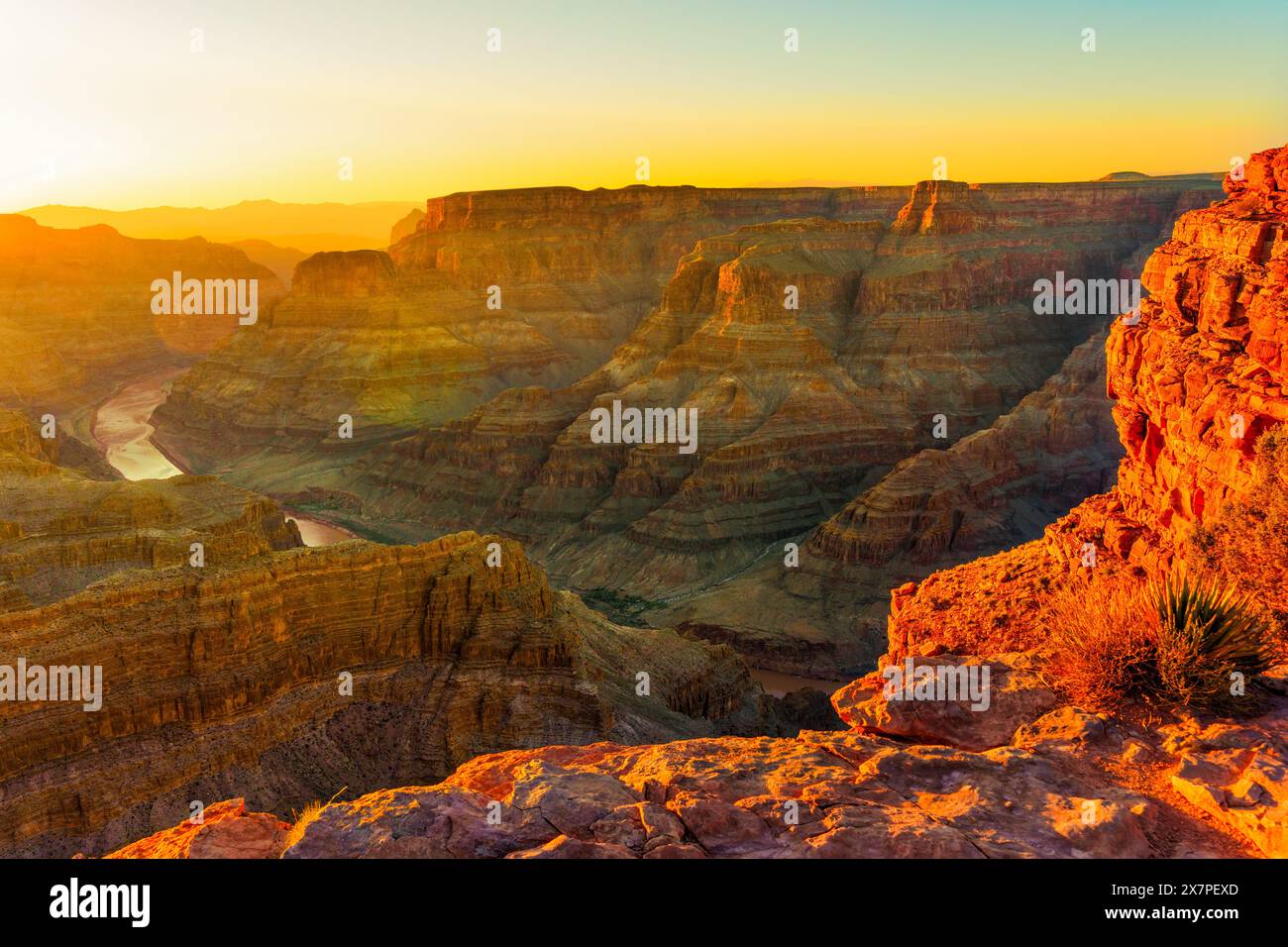 Sunlit panorama of the Grand Canyon, showing stratified walls and the ...