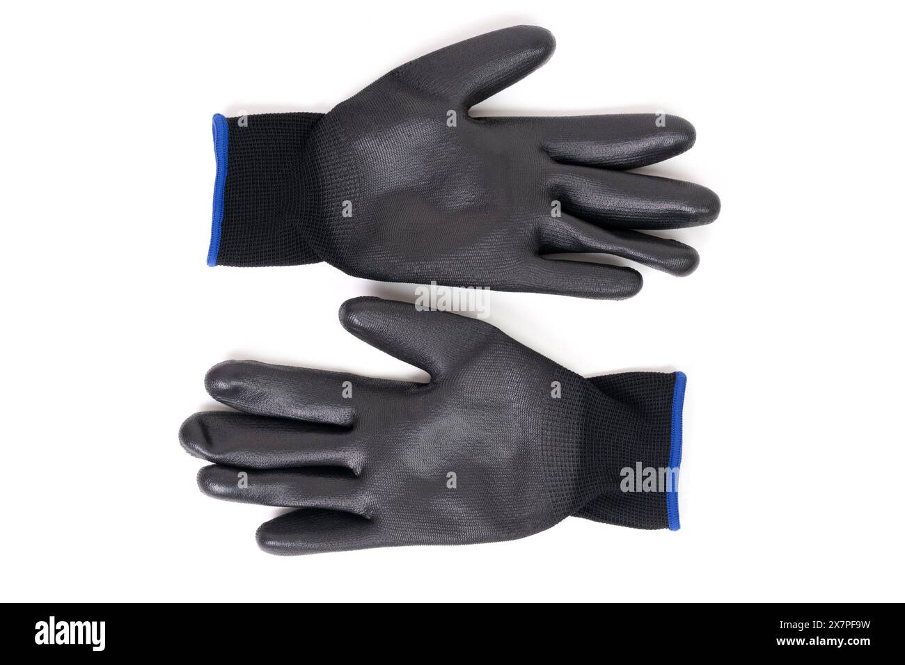A pair of black work gloves with a polyurethane protective coating on a ...
