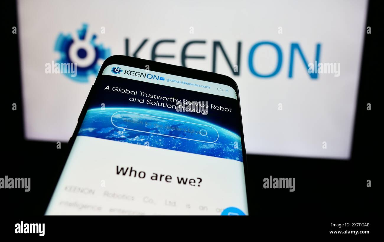 Smartphone with website of Chinese service robot company Keenon ...