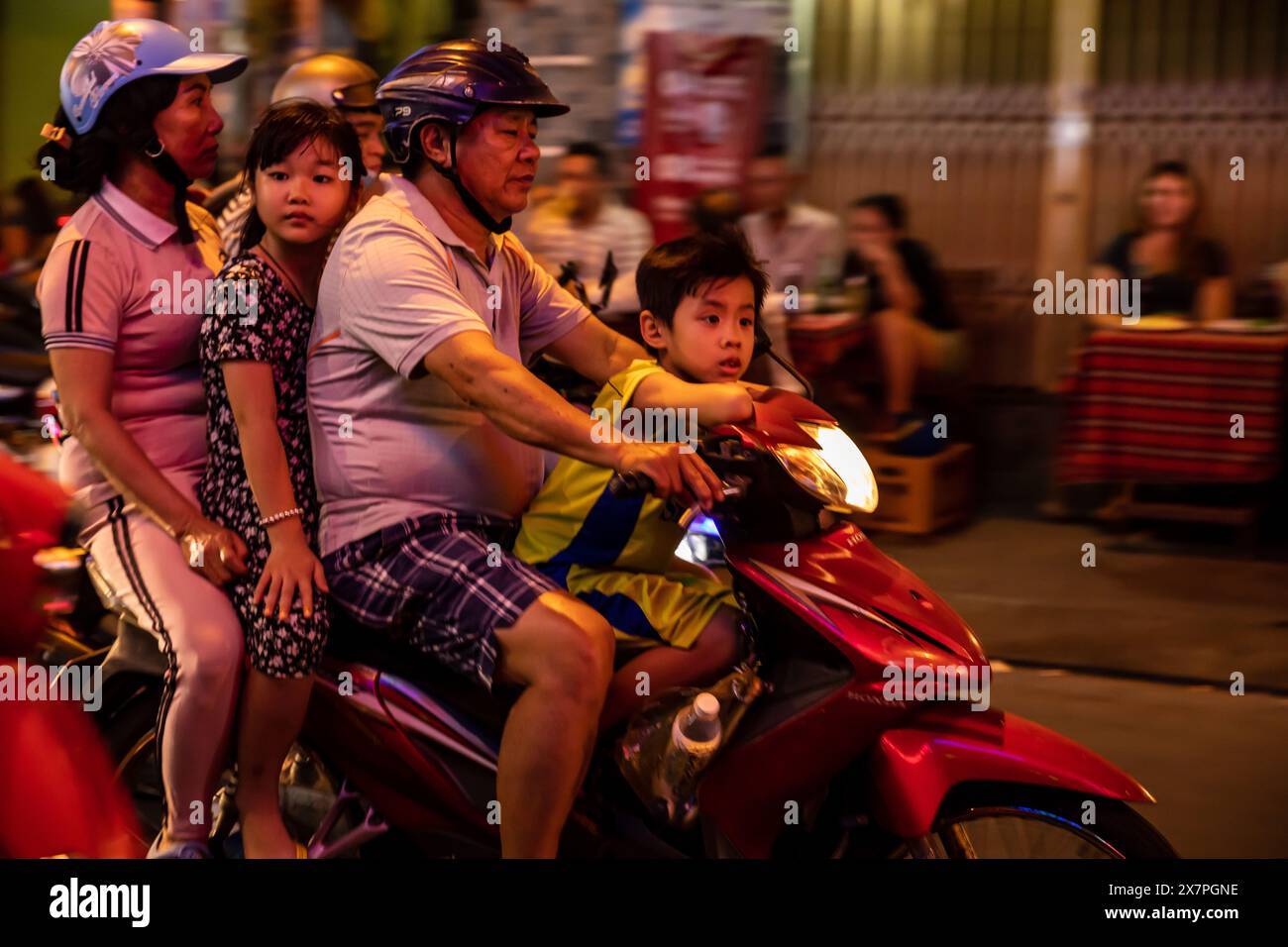 The traffic and motorcycle ride in the city of Saigon in Vietnam Stock ...