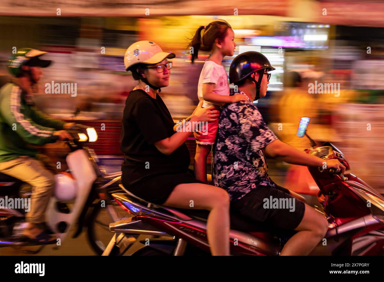 The traffic and motorcycle ride in the city of Saigon in Vietnam Stock ...