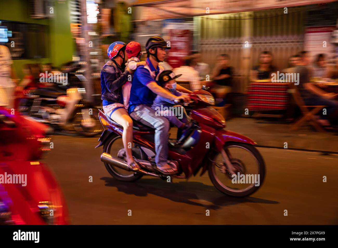 The traffic and motorcycle ride in the city of Saigon in Vietnam Stock ...