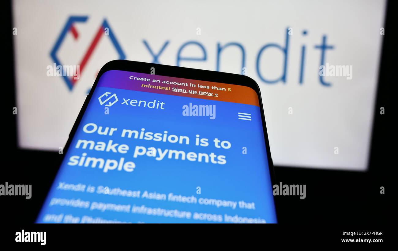 Mobile phone with website of Indonesian company PT Sinar Digital ...