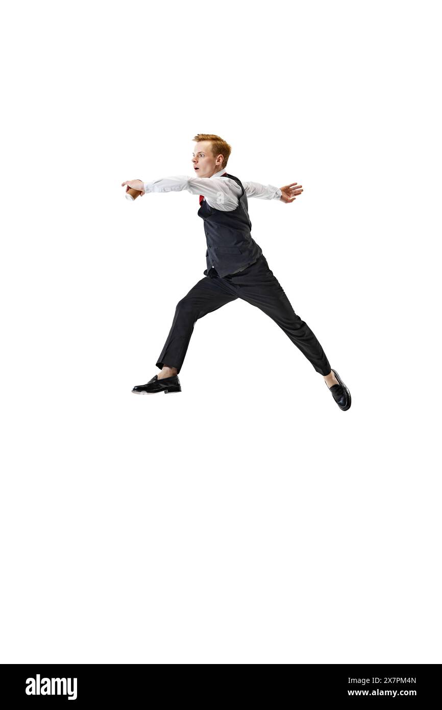 Young man dressed smart casual outfit drinks coffee while running ...
