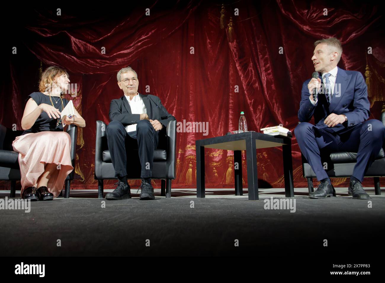 The Turkish novelist and screenwriter Orhan Pamuk (center) with the ...
