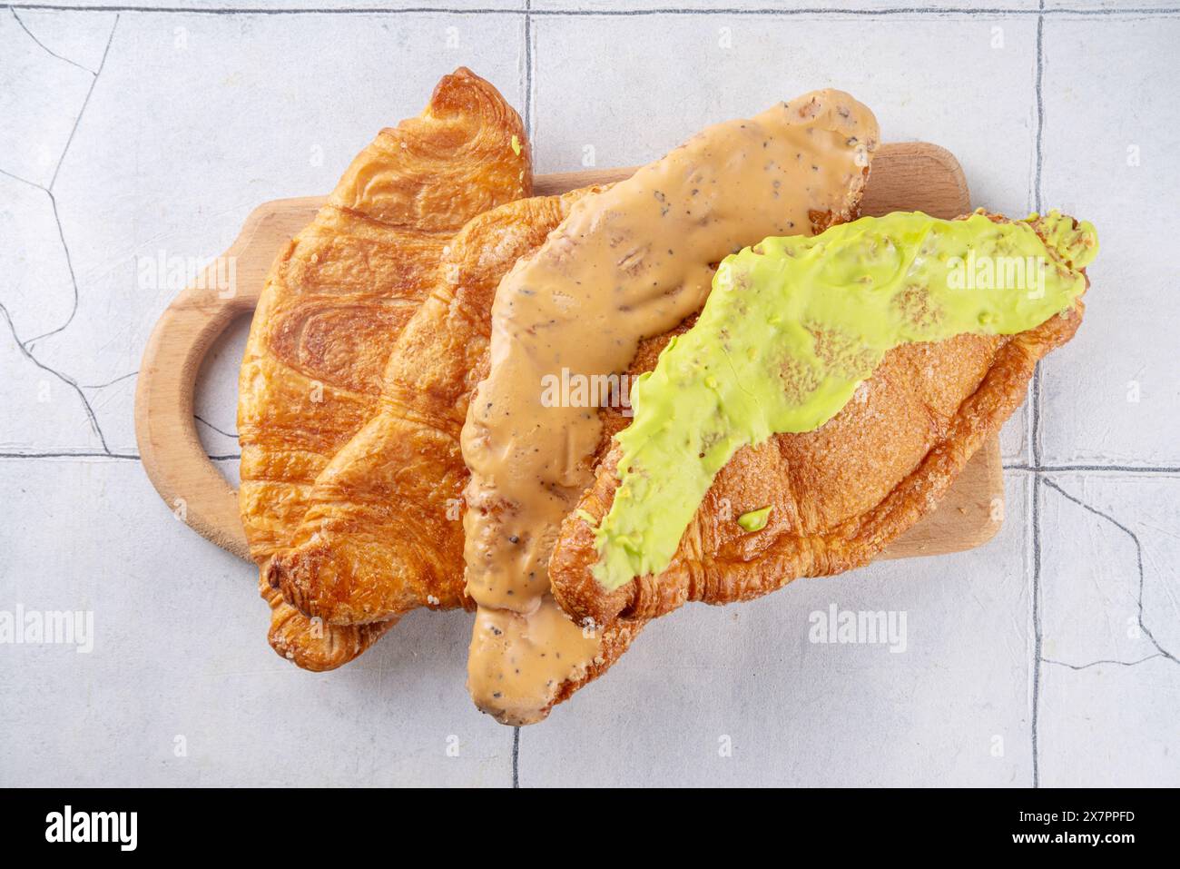 Set of colorful trendy flat croissants with different topping and ...