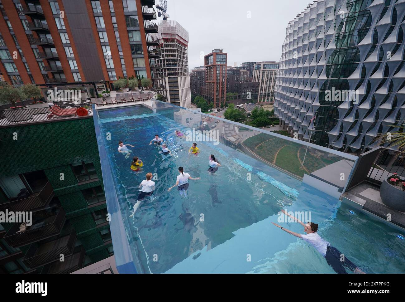 RNLI Lifeguards Courtney Randino and Dominik Fajkiel demonstrate the Float to Live technique to ...