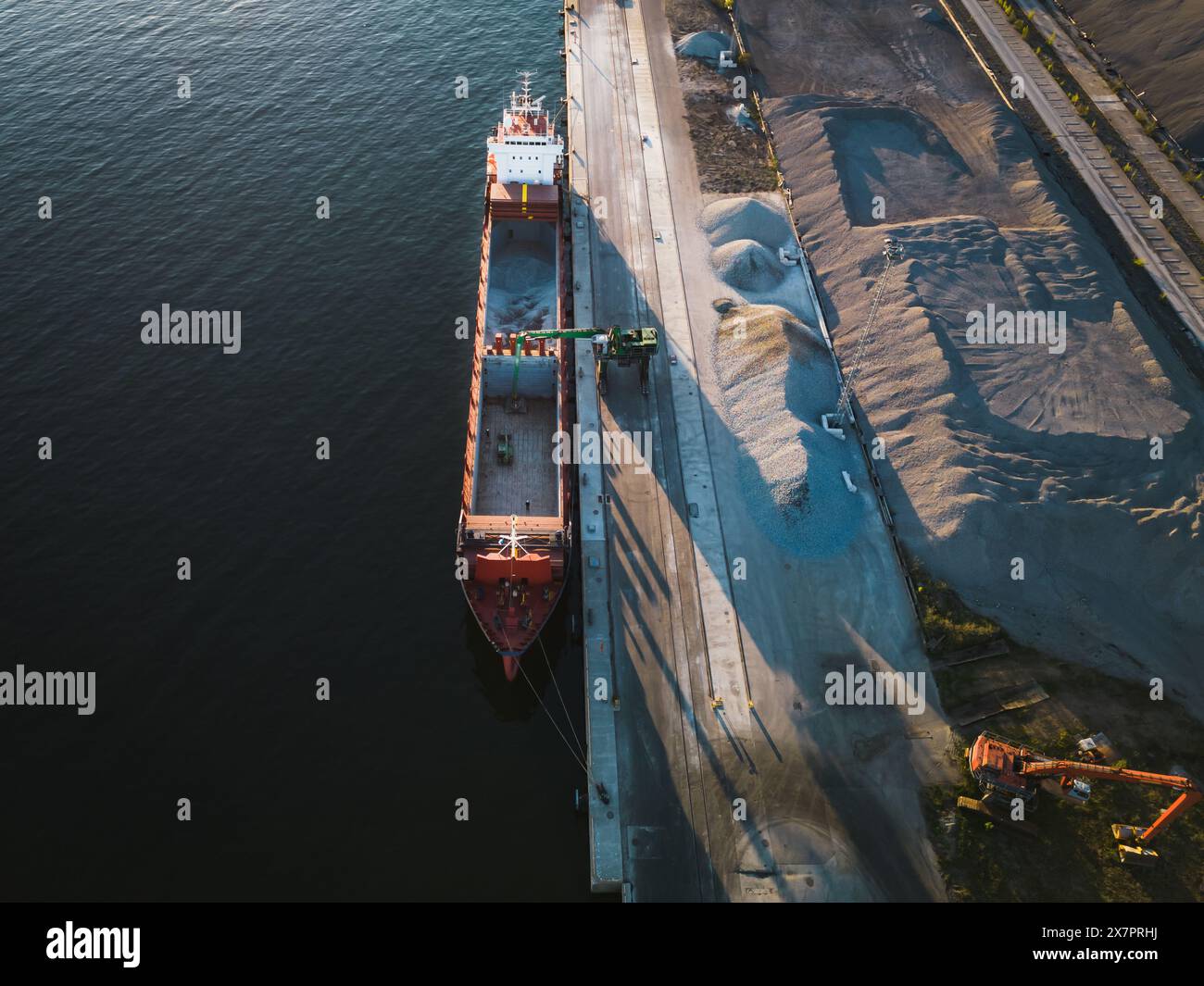 Unloading of a sea-based dry cargo vessel in the port of Muuga, photo ...