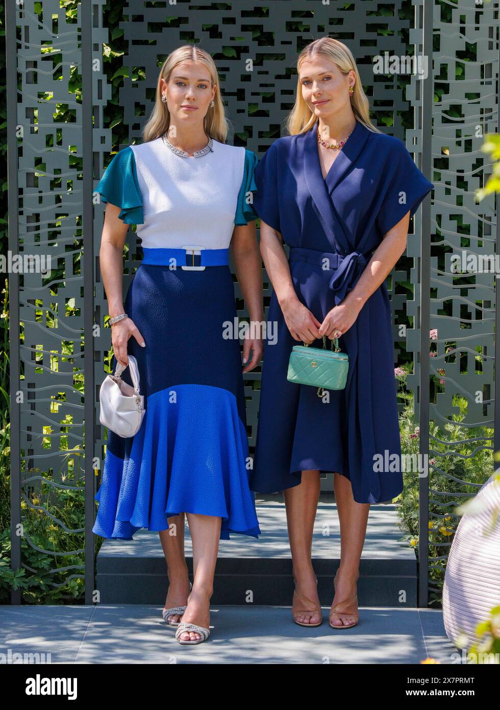 Lady Amelia Spencer (L) and her twin sister Lady Eliza Spencer (R) wear ...