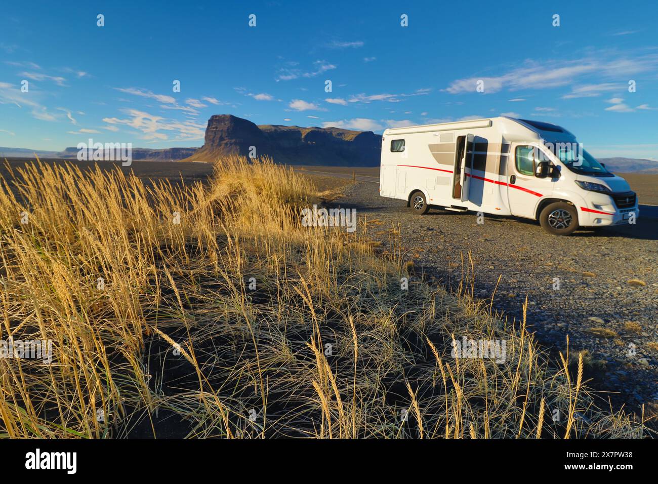 caravan in a beautiful Icelandic landscape. road travel is a way of ...