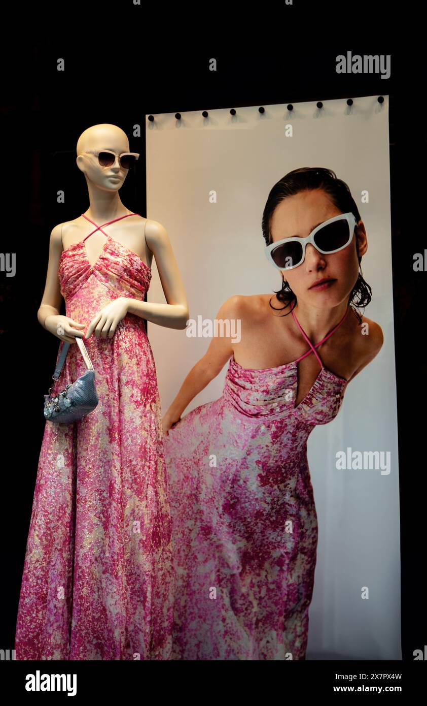 Luxury fashion store window showcases mannequin, artistic display ...