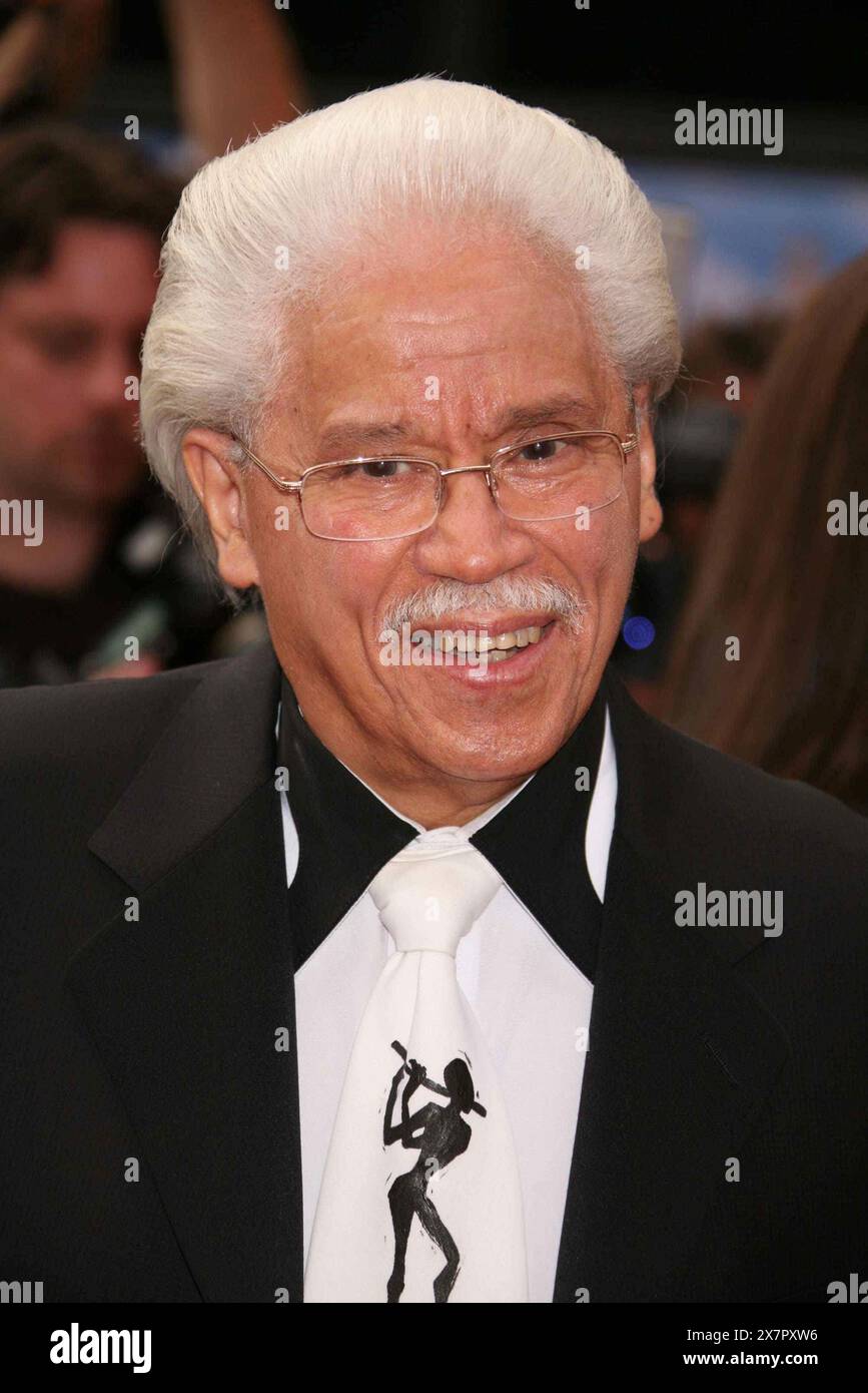 Johnny Pacheco attends the premiere of "El Cantante" at AMC Theater in ...