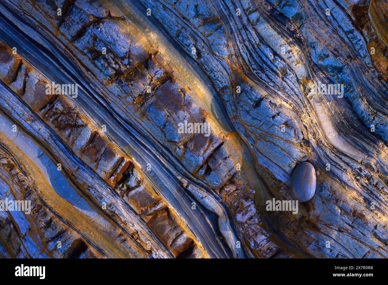 Abstract aerial view of textured rock formations with intricate ...