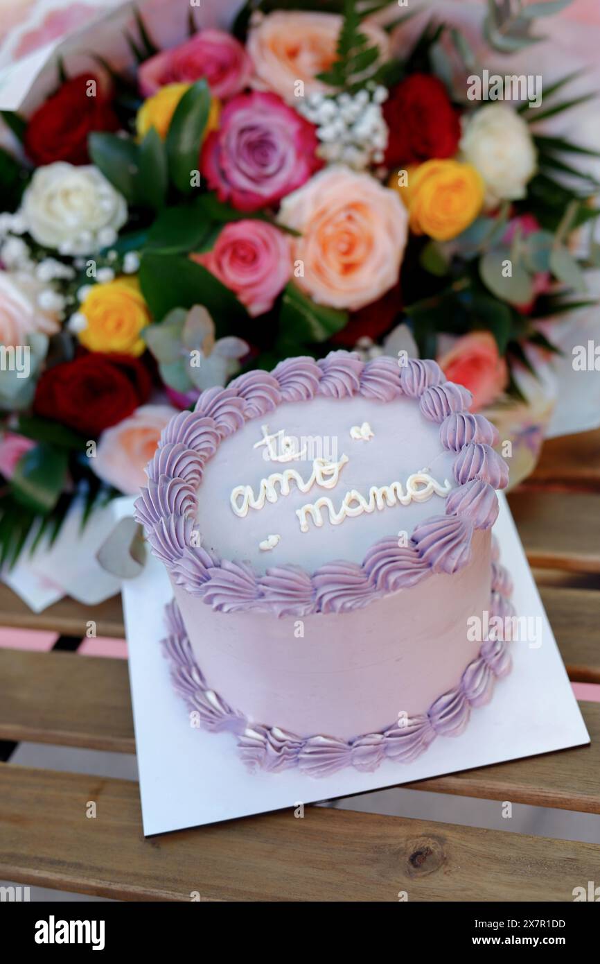 A beautifully decorated lavender frosted cake with the inscription Te ...