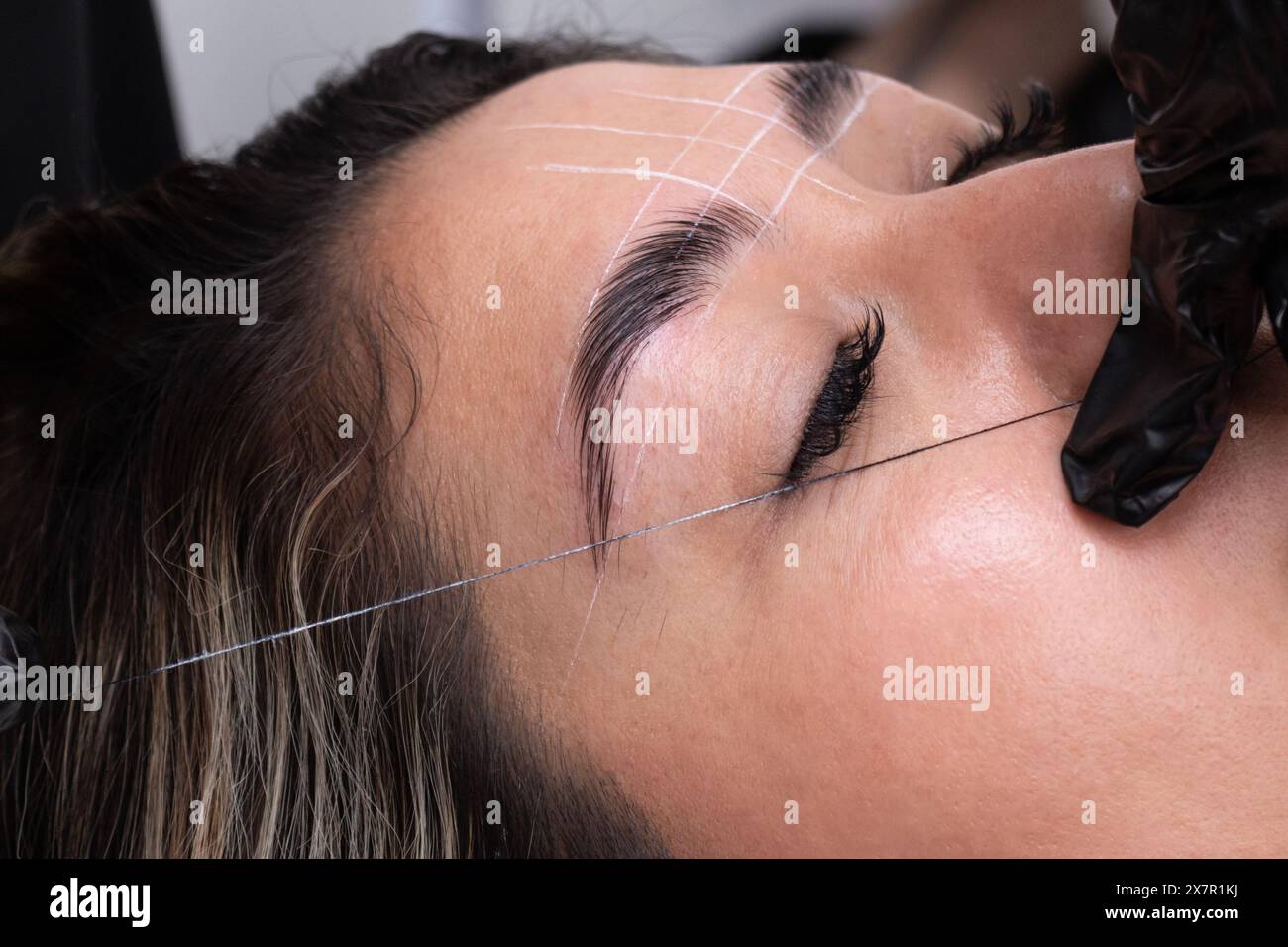 Eyebrow threading hi-res stock photography and images - Alamy