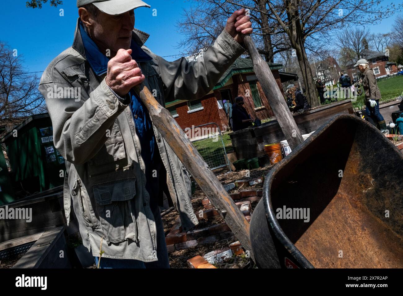 Preparing the soil before planting at the Dufferin Grove Park shared ...