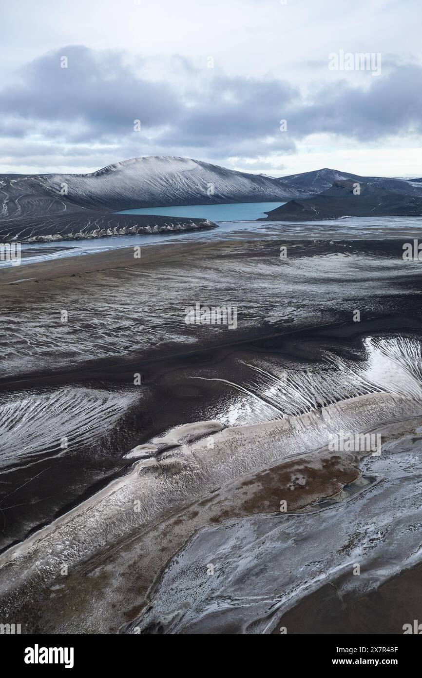 An aerial perspective showcases the tranquil beauty of snow-dusted ...