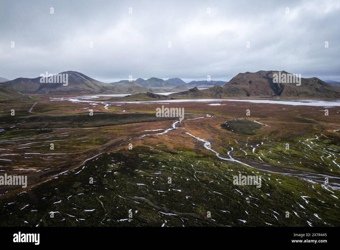 An expansive aerial shot captures the natural beauty of highland ...