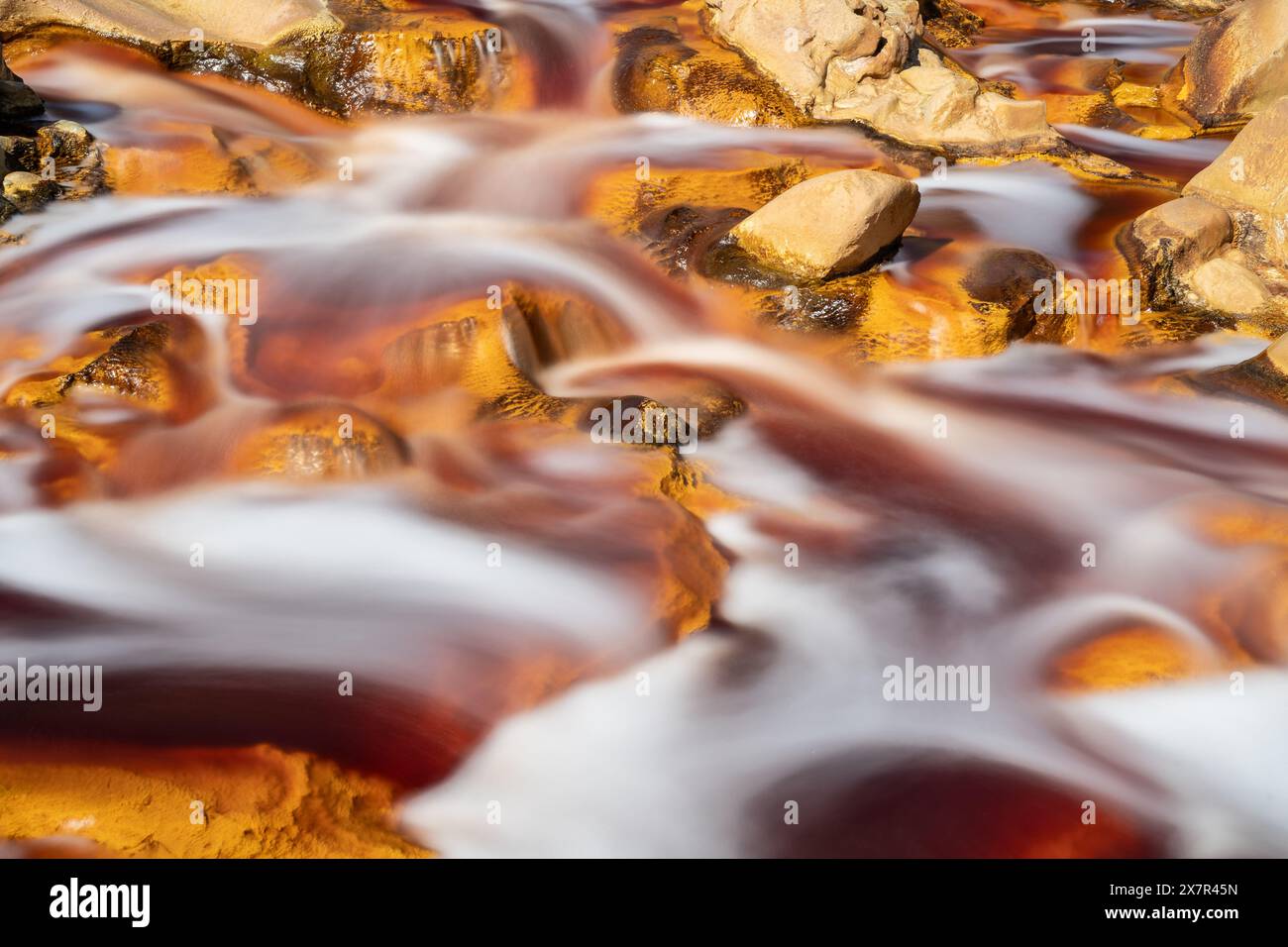 Captivating image showing the vibrant orange waters of the Riotinto ...