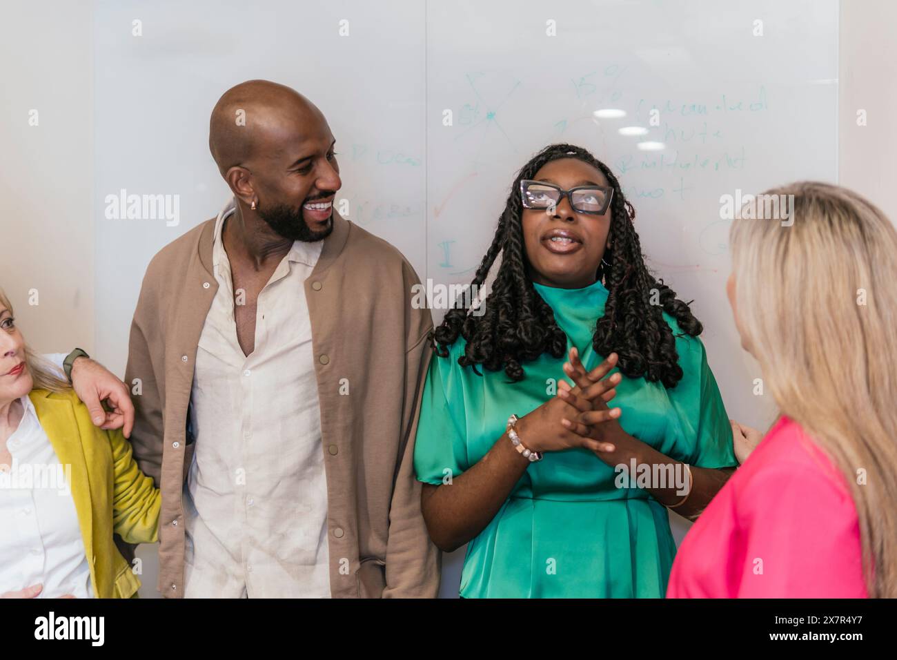 A diverse group of professionals engaging in a positive discussion ...