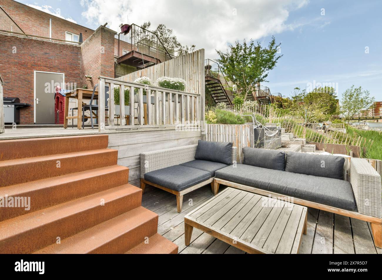 Modern outdoor patio setup at a residential building showcasing stylish ...