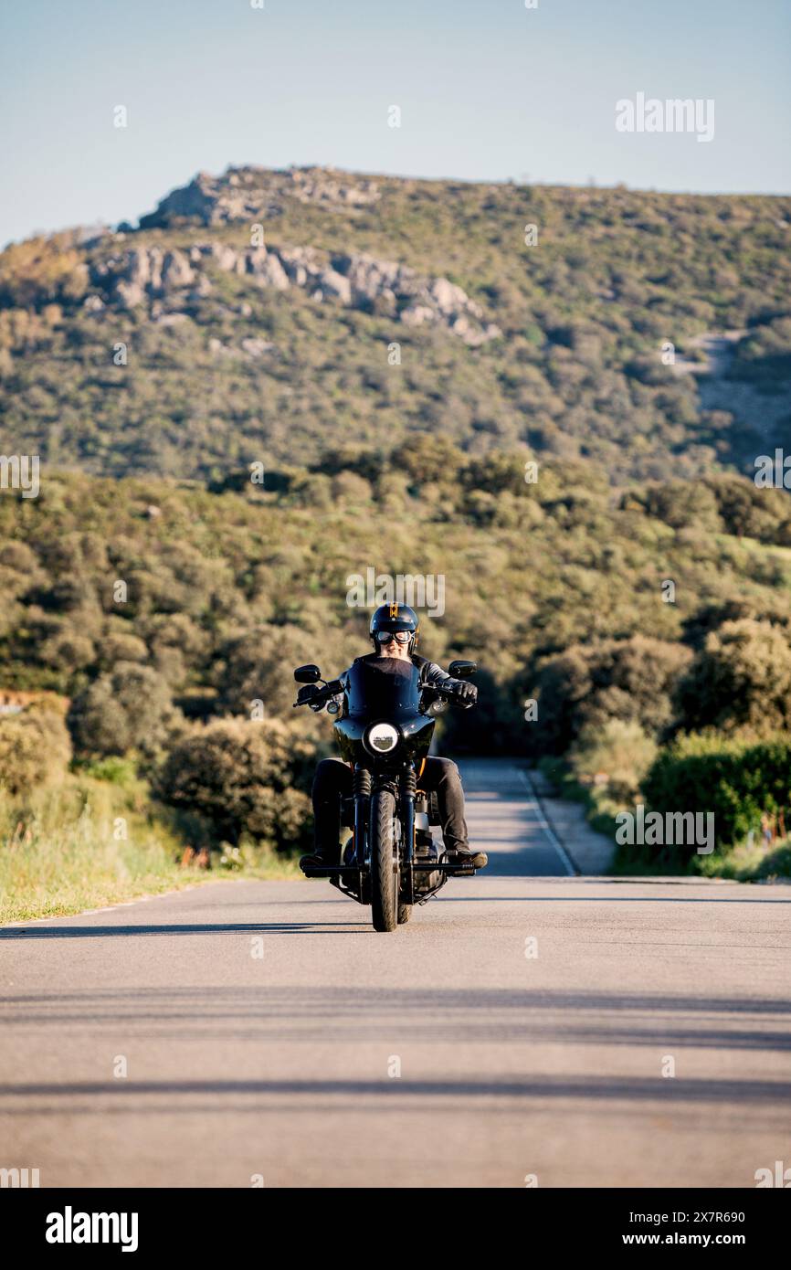 Wearing motorcycle helmet hi-res stock photography and images - Alamy