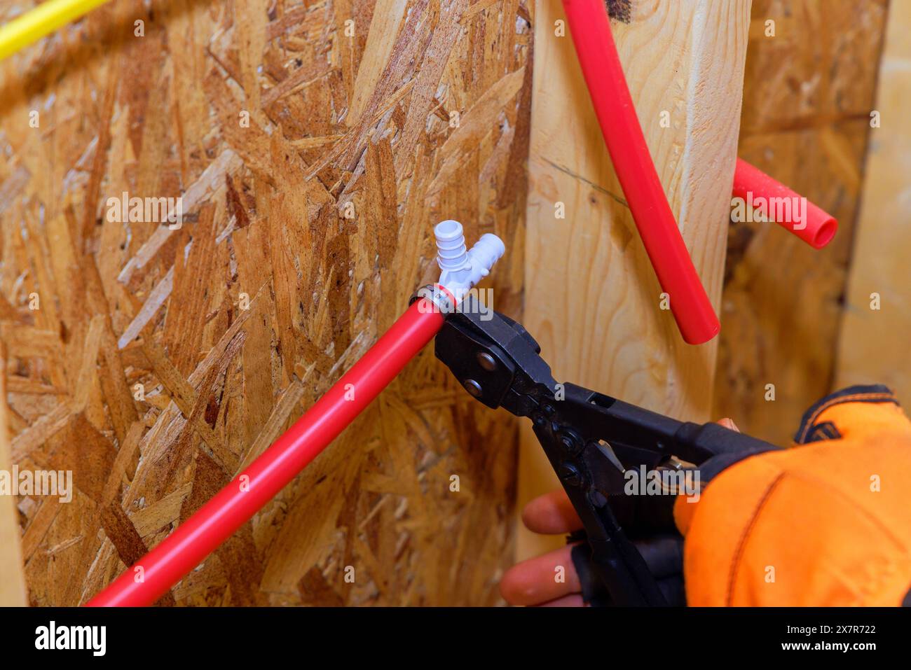 Plumbing installation connection to plastic PVC water pipes in wall ...