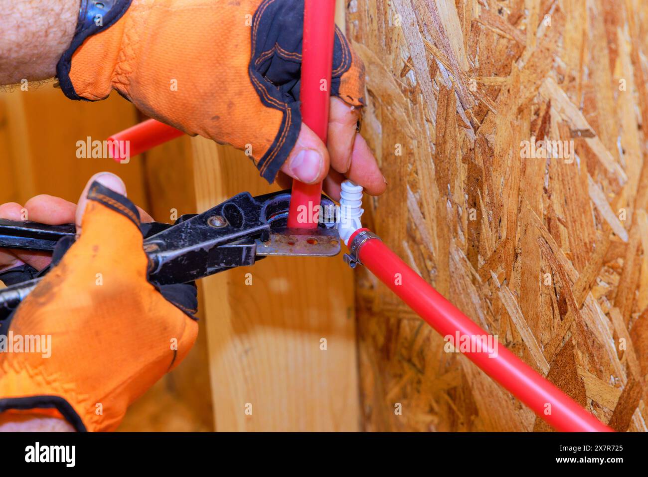 An installation connection to PVC plastic water pipes is completed by ...