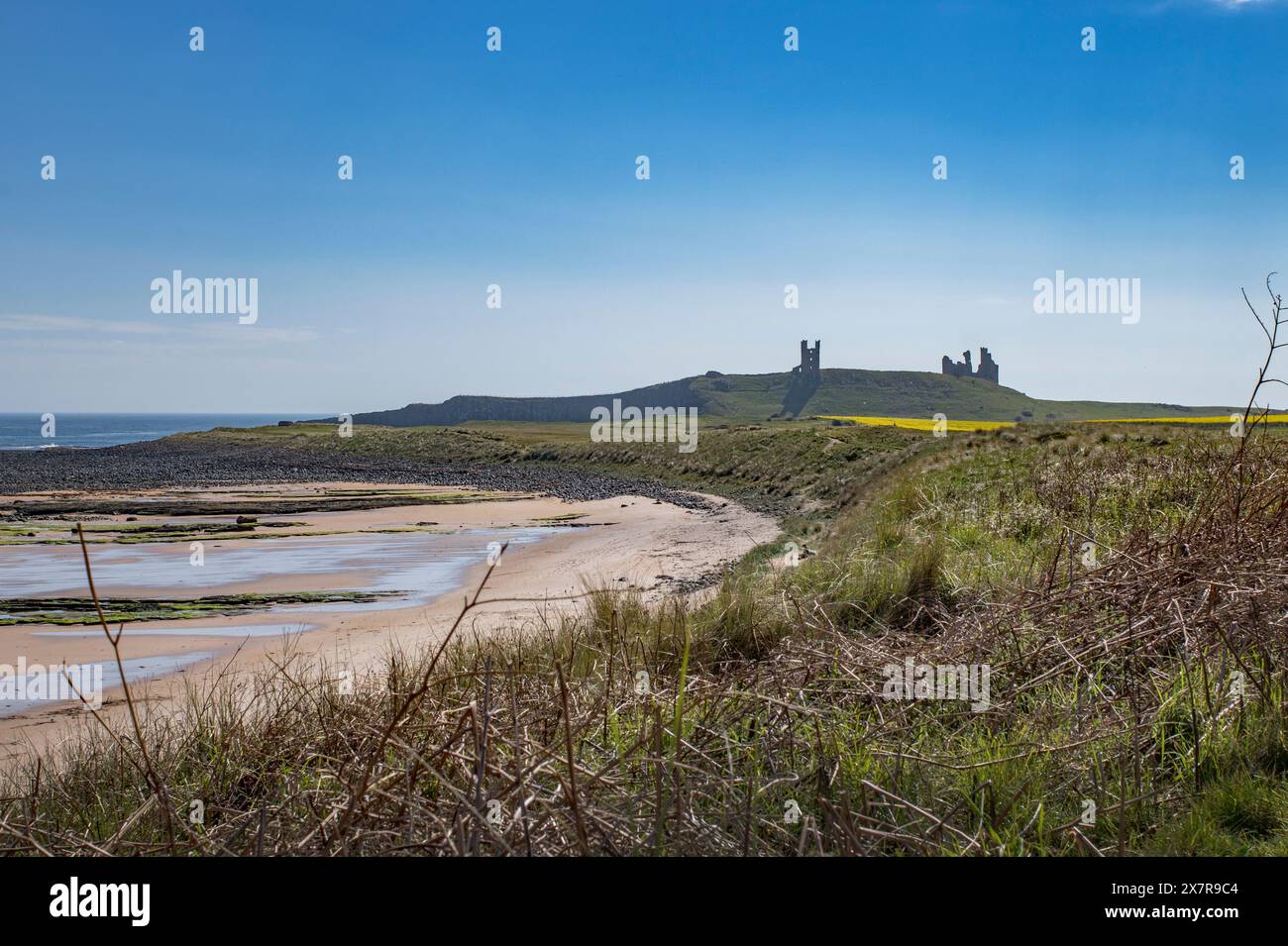Embleton Northumberland beach near ruined castle Stock Photo - Alamy