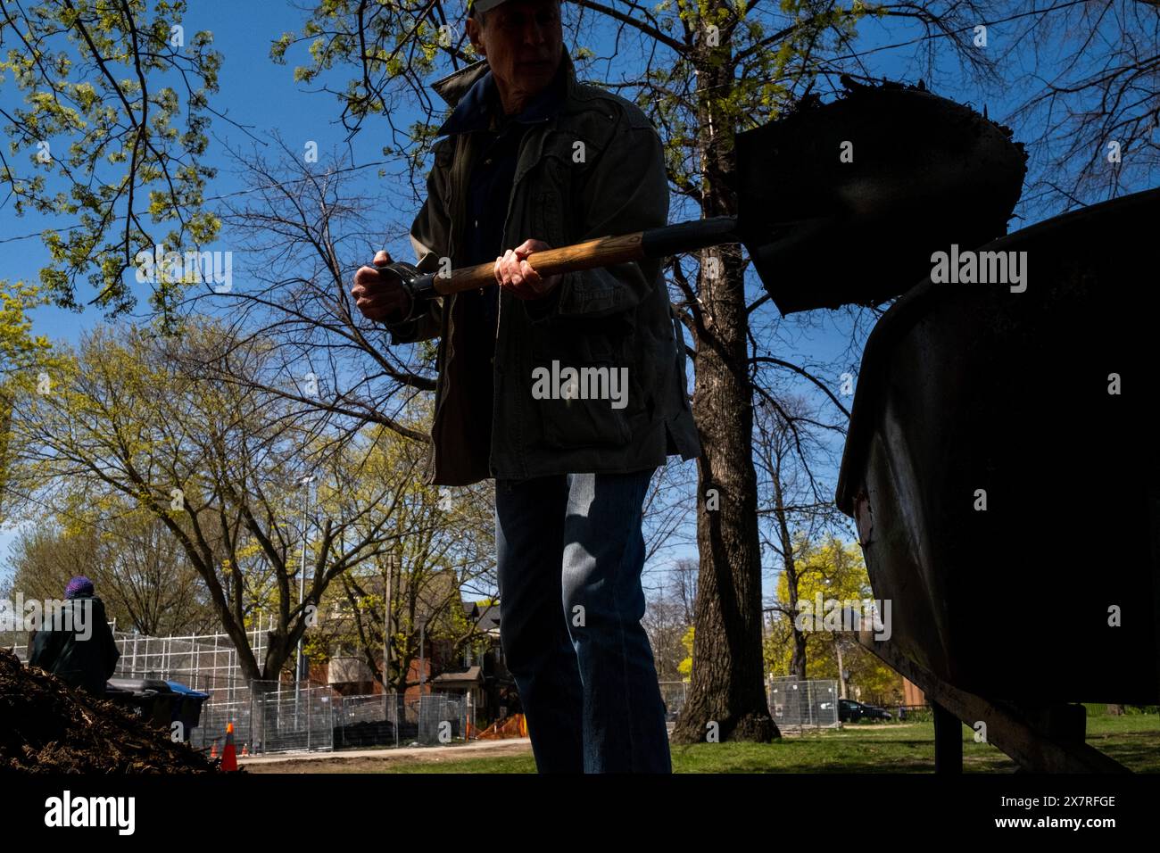 Preparing the soil before planting at the Dufferin Grove Park shared ...