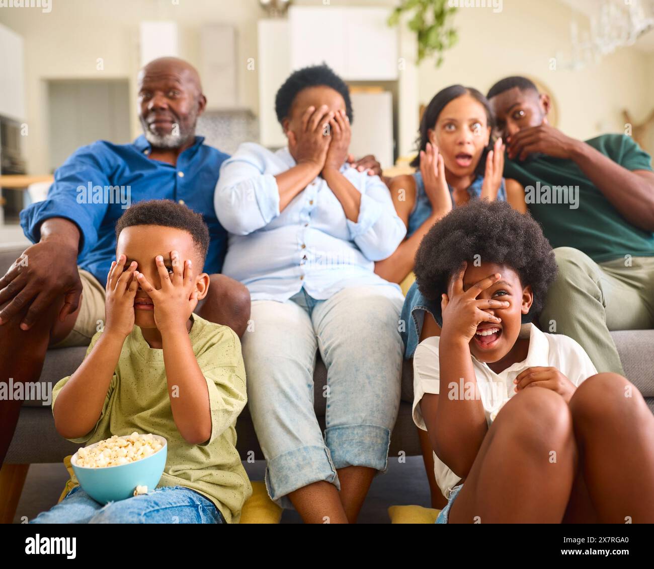 Scared children watching tv hi-res stock photography and images - Alamy
