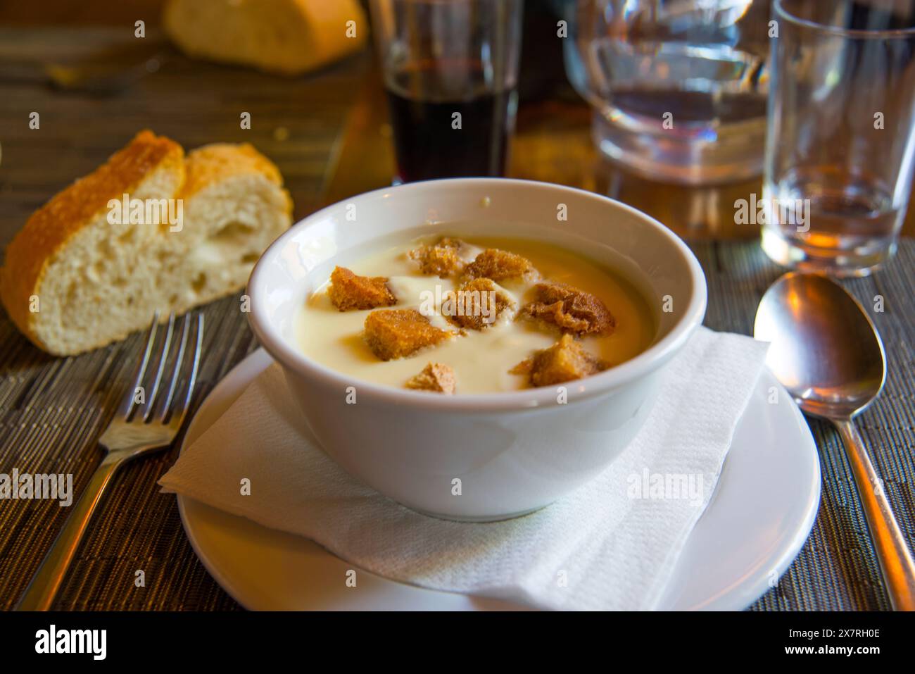 Courgette cream with small pieces of bread Stock Photo - Alamy